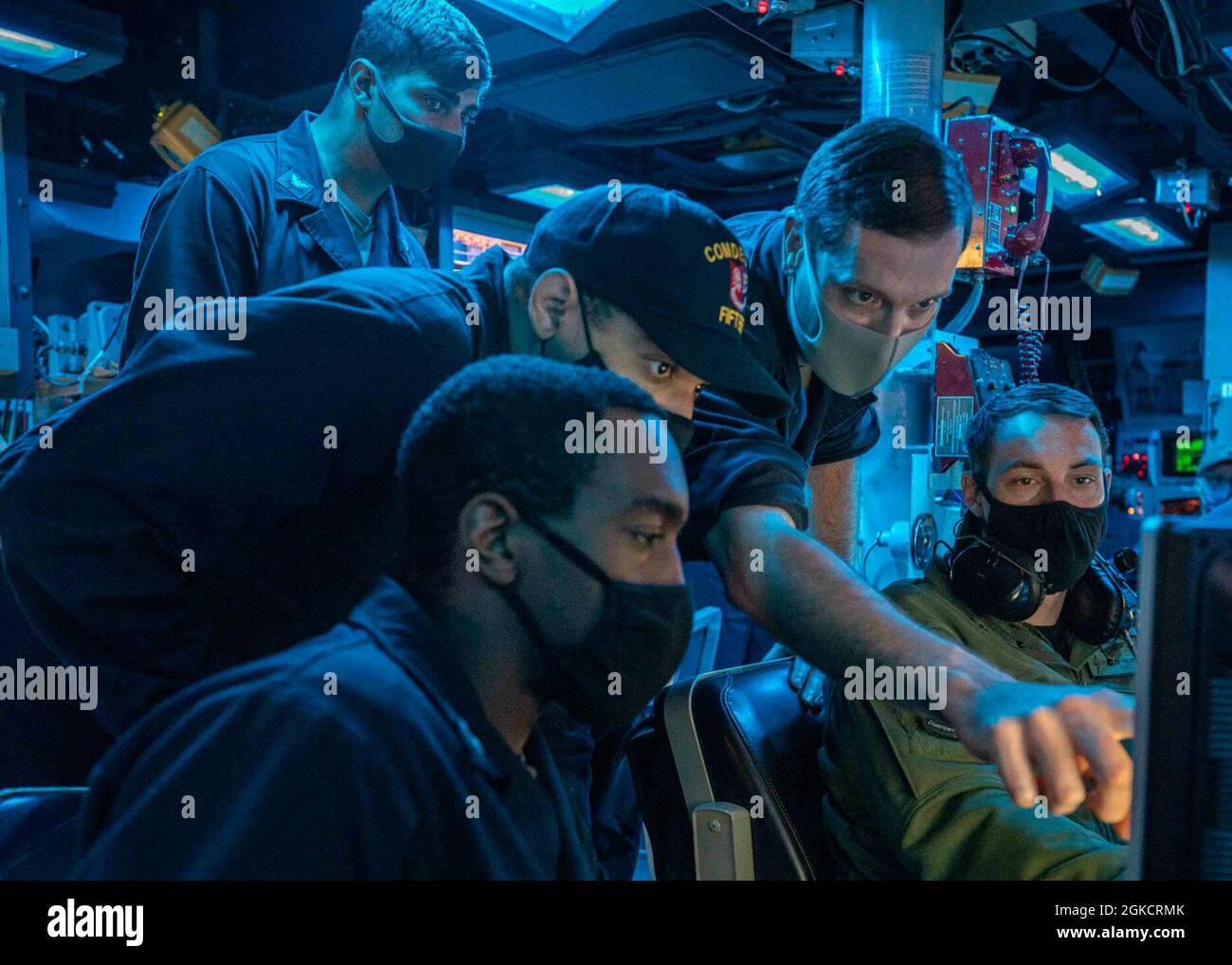 Sailors assigned to Destroyer Squadron (DESRON) 15 participate in an ...