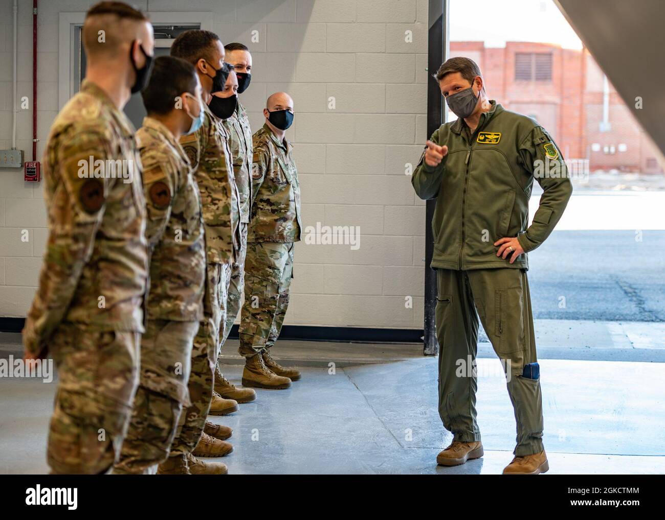 U.S. Air Force Col. David Lopez, 1st Fighter Wing commander, addresses ...