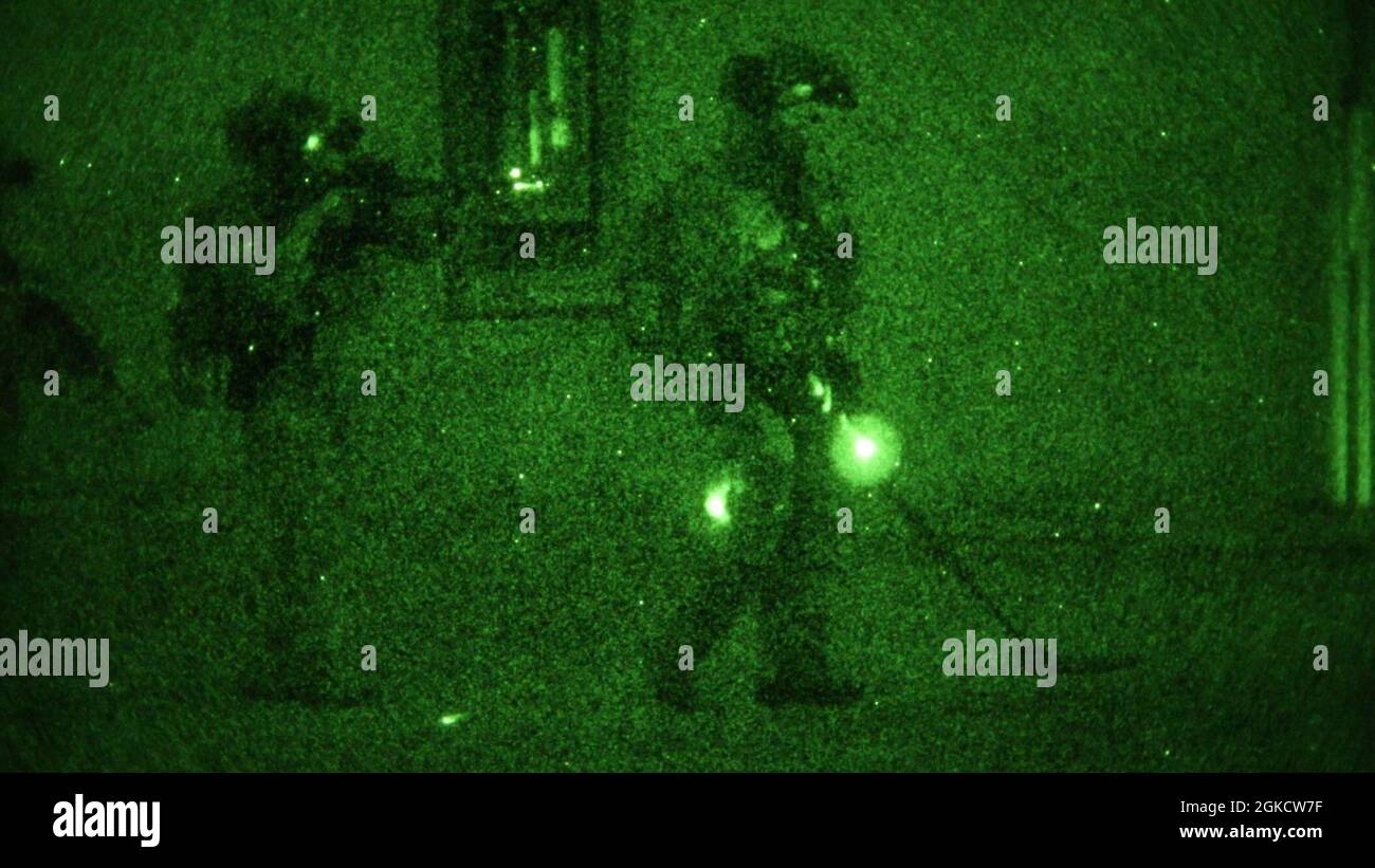 A U.S. Army EOD Technician from 53rd Ordnance Company (EOD) clears a ...