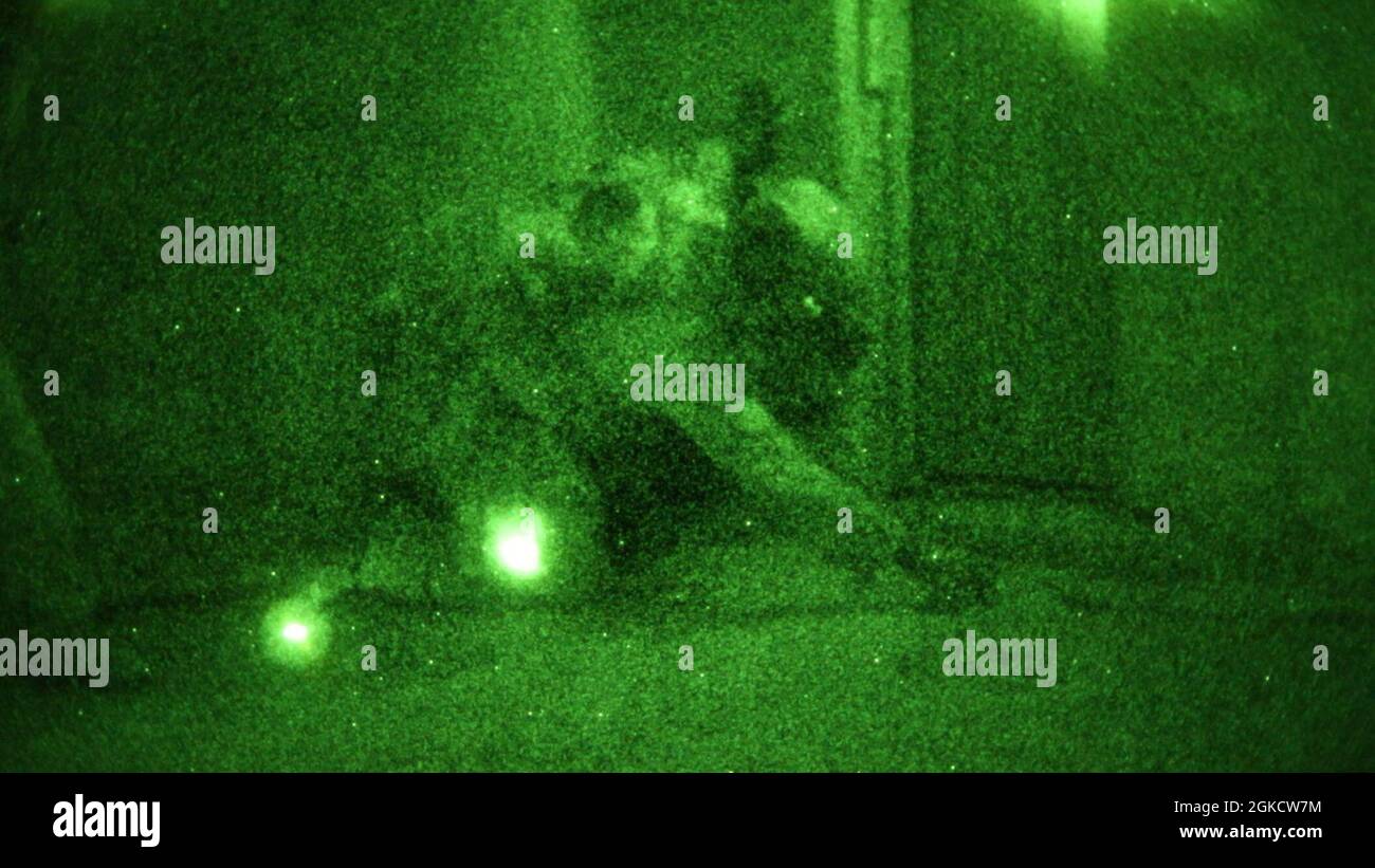 A U.S. Army EOD Technician from 53rd Ordnance Company (EOD) clears a ...