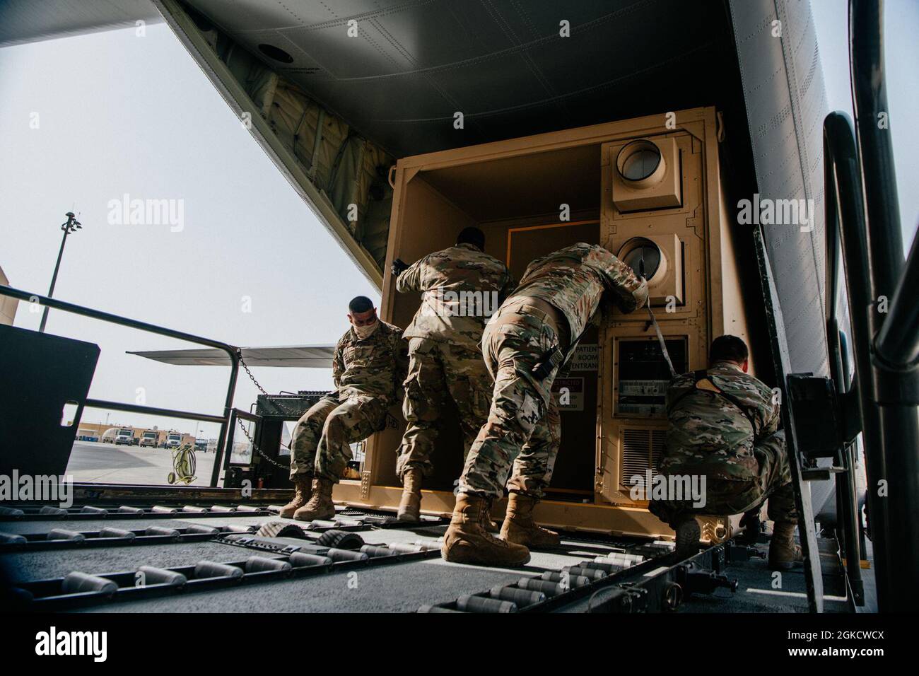 U.S. Air Force ramp service specialists with the 8th Expeditionary Air ...