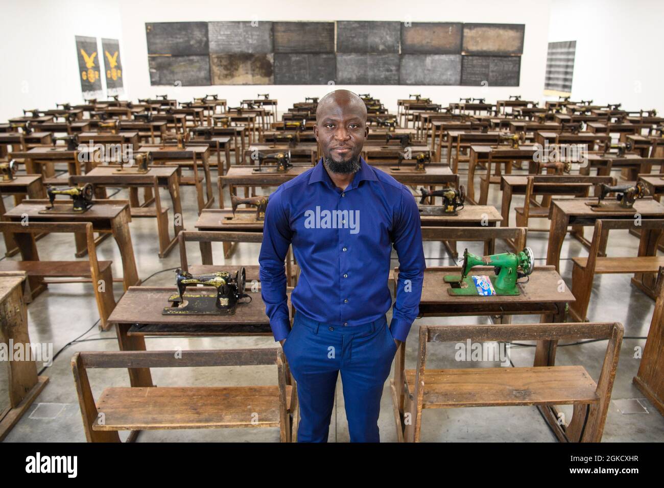 London, UK. 14 September 2021. Ibrahim Mahama pictured with his artwork ...