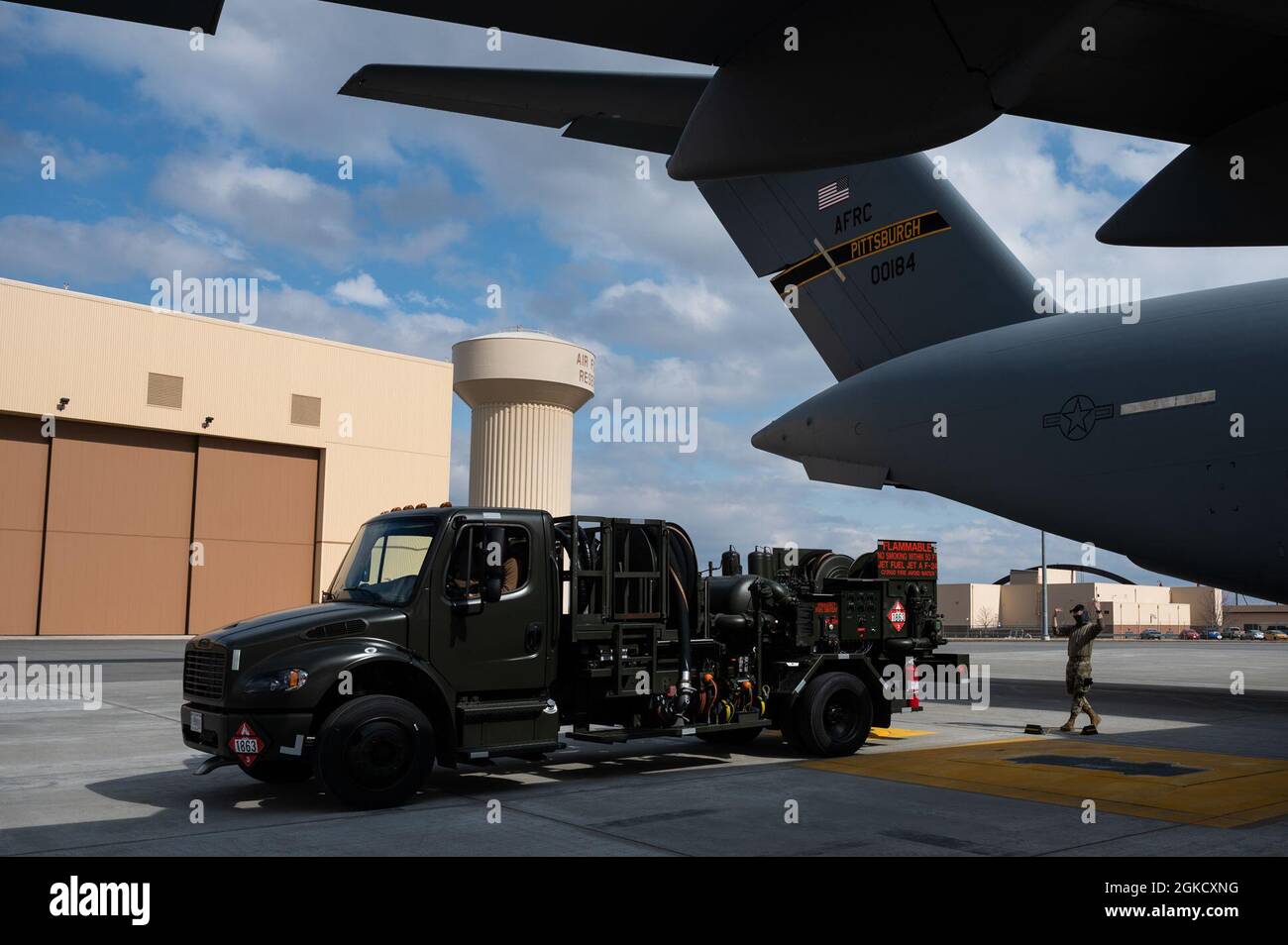 An Airman assigned to the 911th Aircraft Maintenance Squadron directs a ...