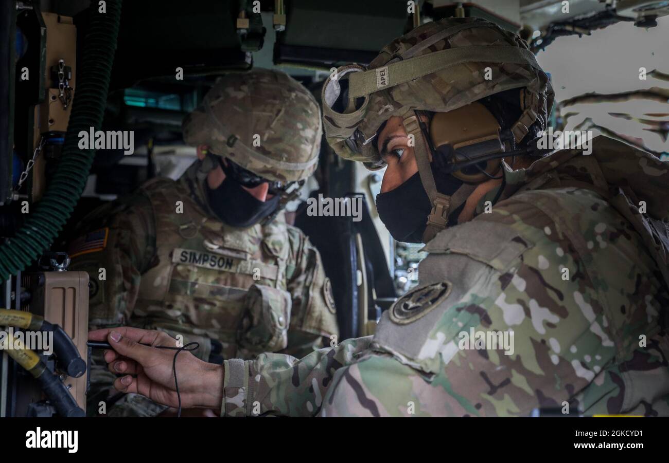 U.S. Army Sgt. Jeffrey Simpson and Sgt. Nicholas Gomez maintain ...