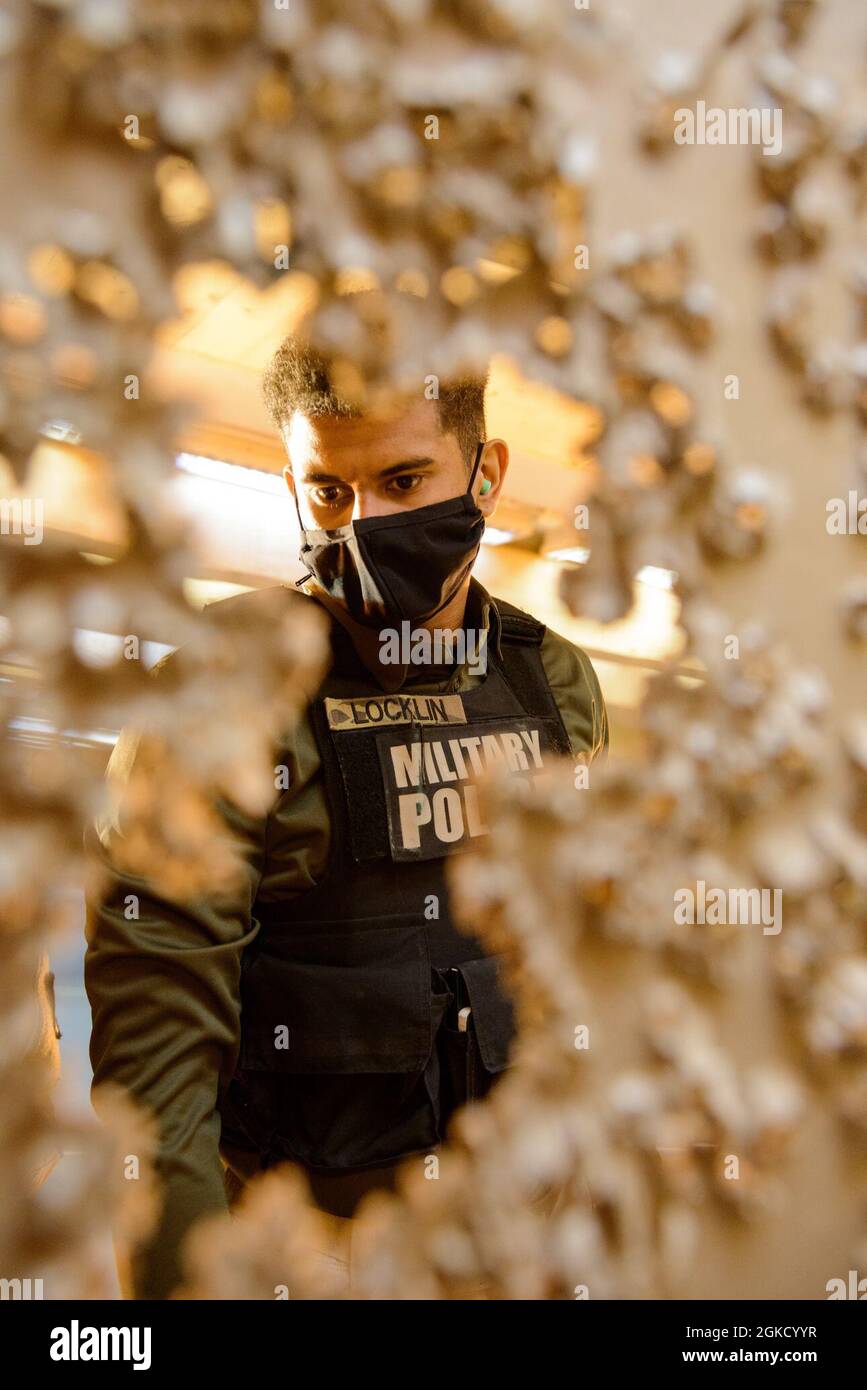 U.S. Army Sgt. Christopher Locklin, a Military Policeman assigned to ...