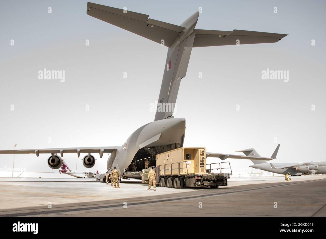U.S. Air Force ramp service specialists with the 8th Expeditionary Air ...