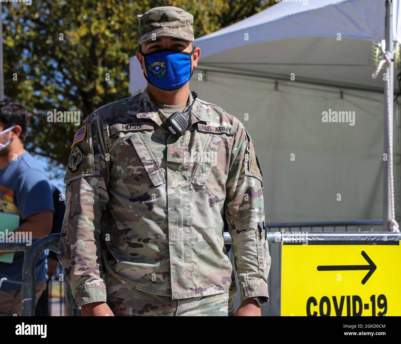 Sgt. John Huss with Joint Task Force 17 works at the entry point at the ...