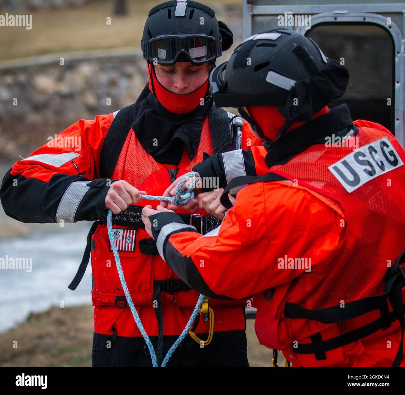 Members of the Coast Guard tie knots in preparation for Team Tethering ...
