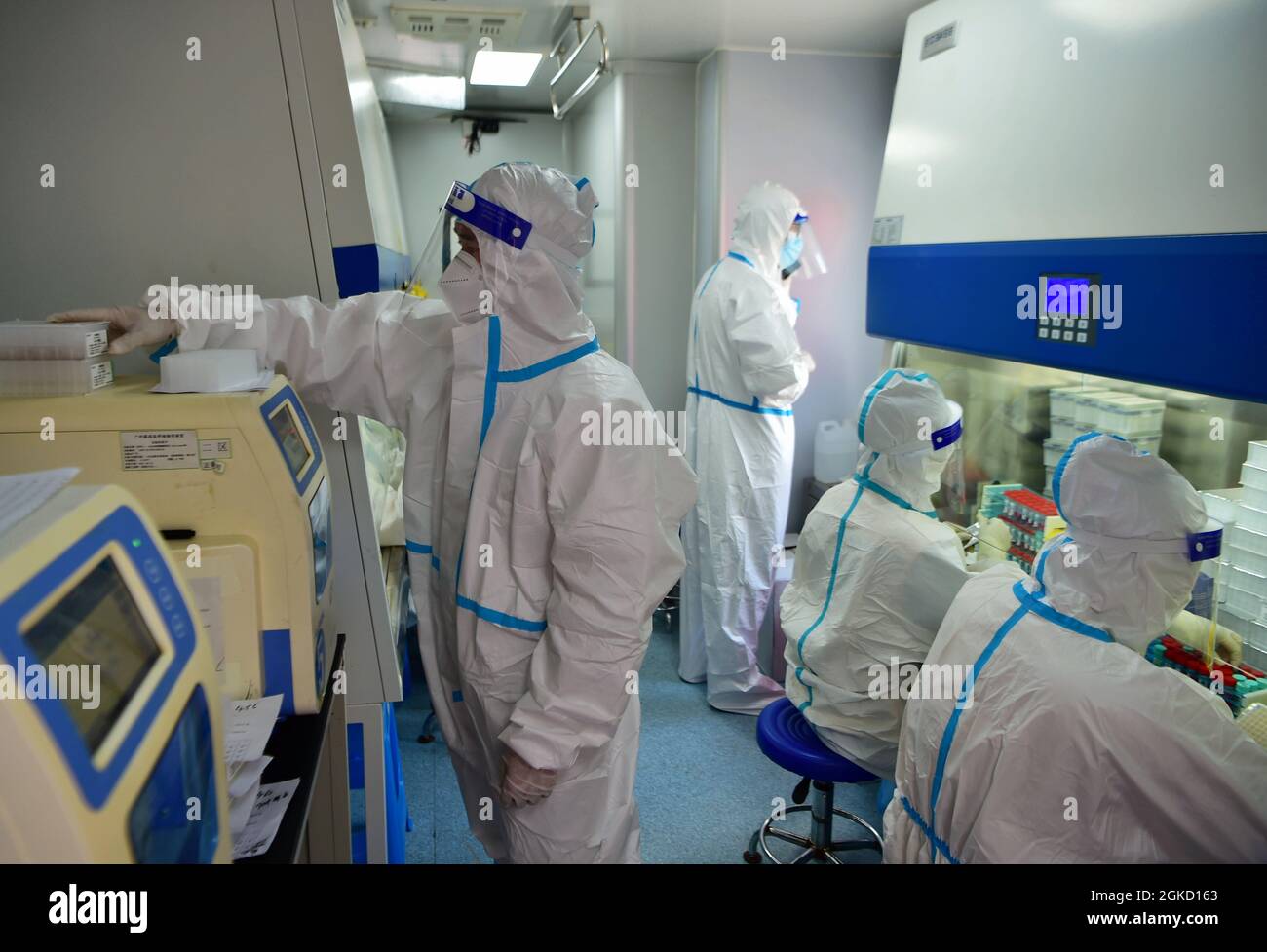 Xianyou, China's Fujian Province. 14th Sep, 2021. Staff members deal ...