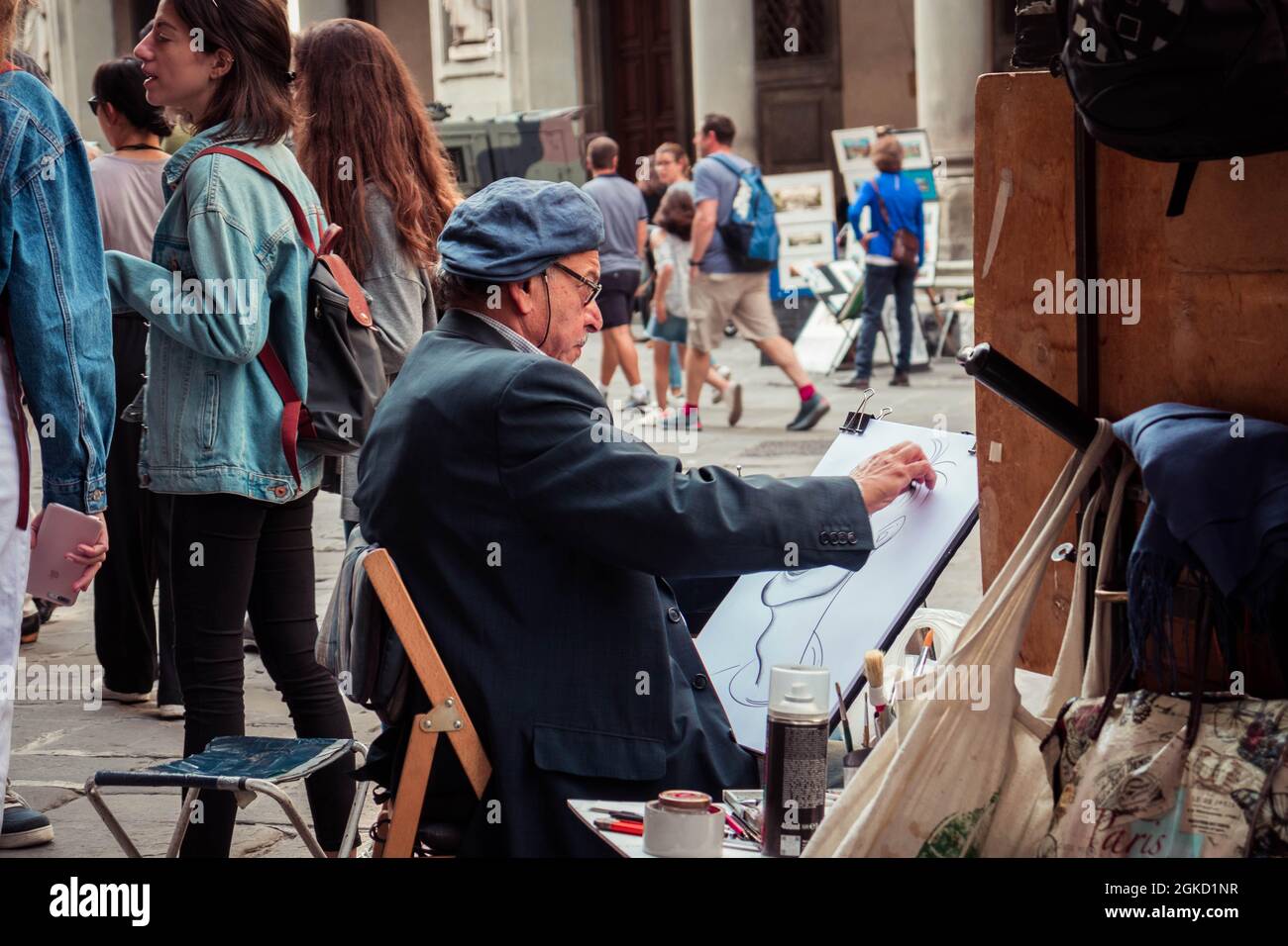 Street artist drawing a portrait Stock Photo - Alamy