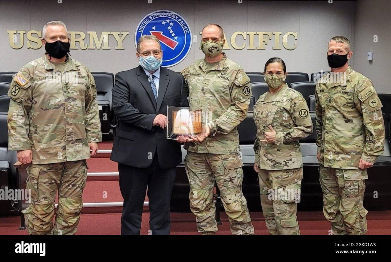 Gen. Paul LaCamera, Commanding General of the USARPAC, congratulates ...