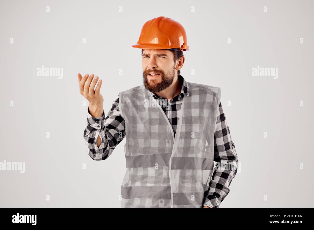 bearded man Construction industry work hand gestures light background ...