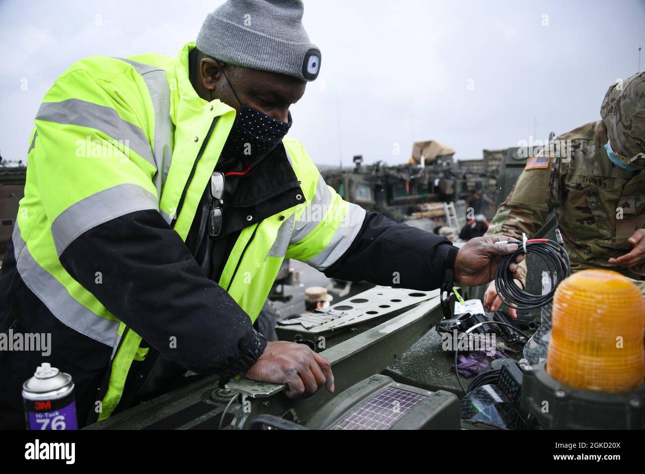 A contractor attaches multiple integrated laser engagement system ...