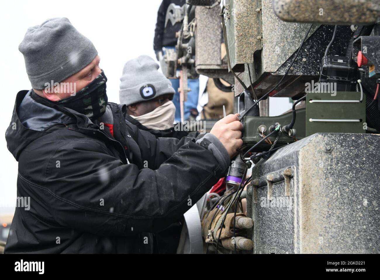 Contractors attach the multiple integrated laser engagement system ...