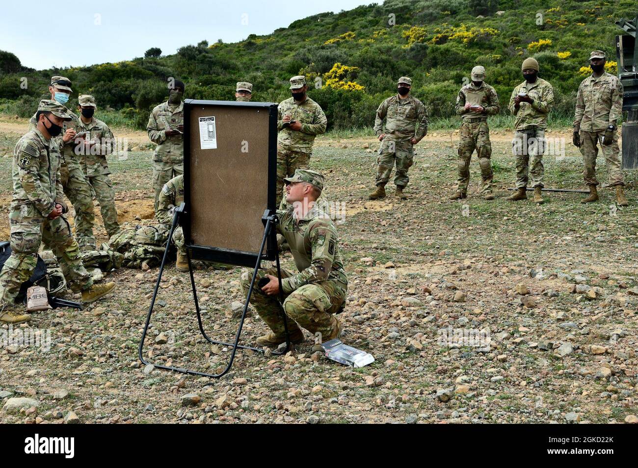 (Center) U.S. Army paratrooper Pfc. Matthew Parker, an Engineer ...