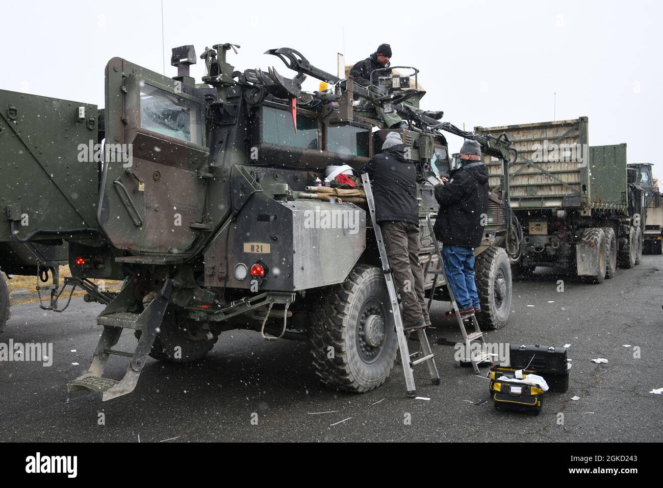 Contractors attach the multiple integrated laser engagement system ...