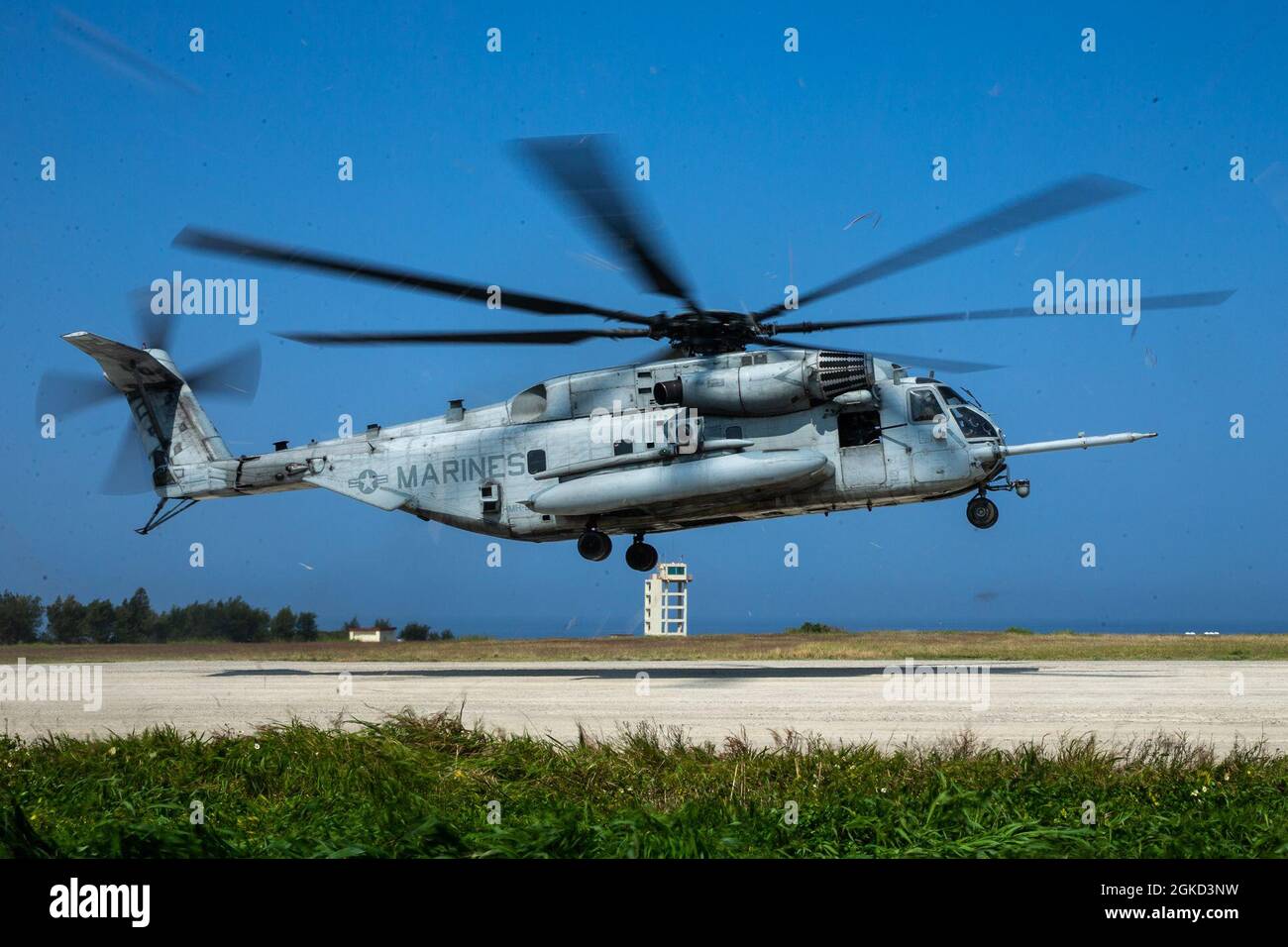 A U.S. Marine Corps CH-53E Super Stallion with 1st Marine Aircraft Wing ...
