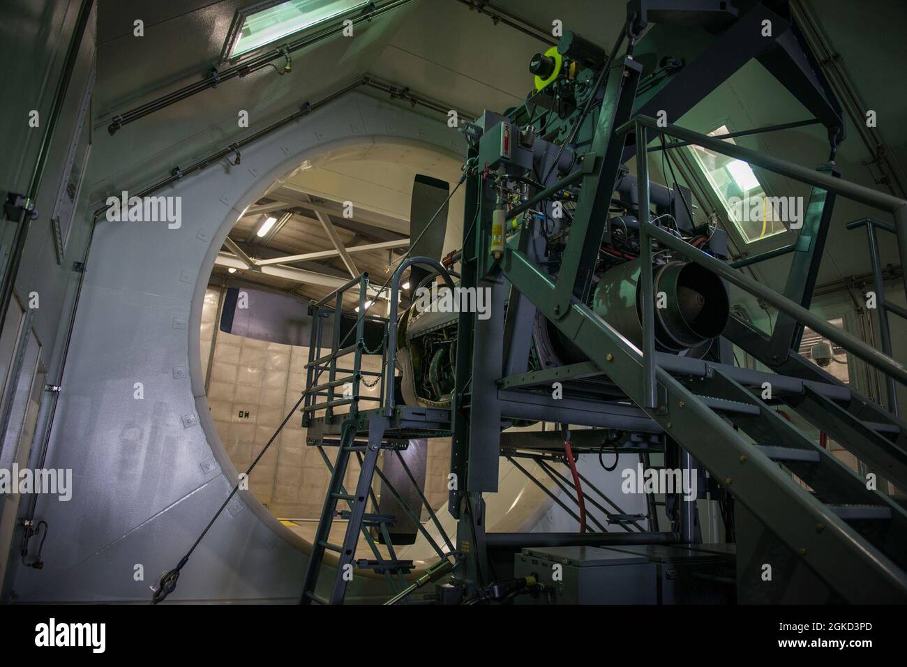 A T56 turboprop engine is mounted to a test cell inside a T-10 Hush ...