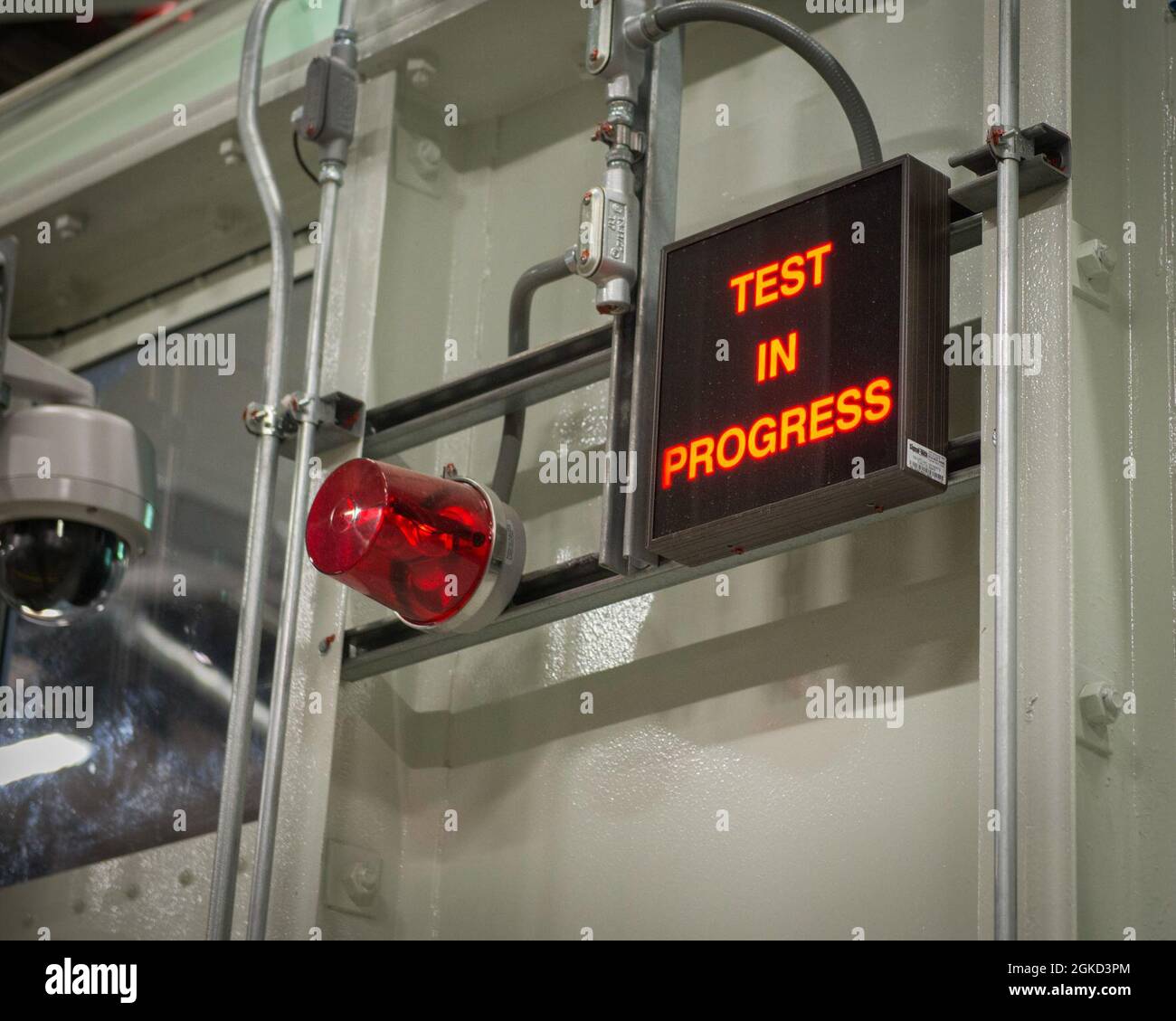 A “Test in Progress” sign is illuminated as 103rd Maintenance Squadron ...