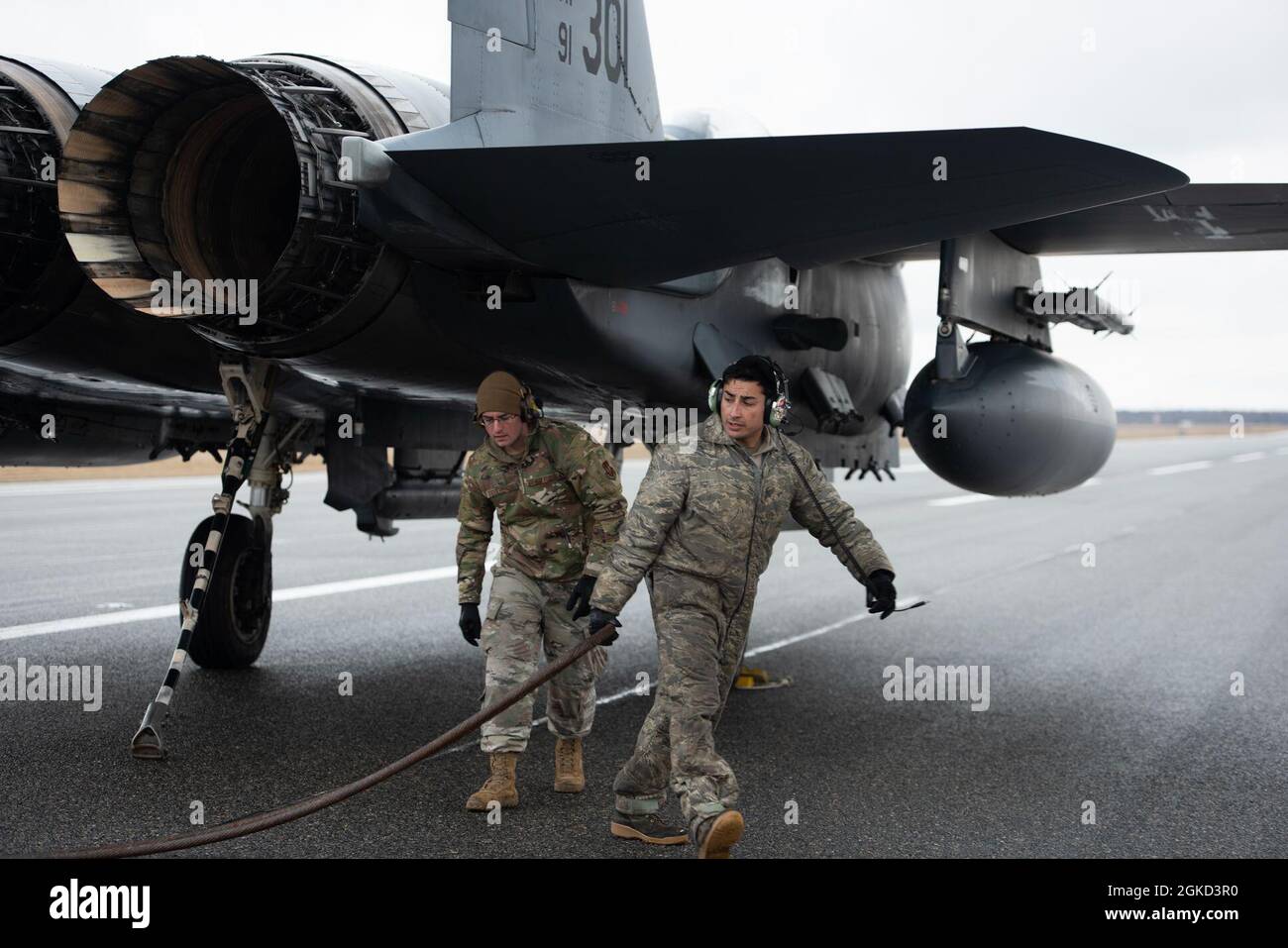 Airmen assigned to the 48th Aircraft Maintenance Squadron release the ...