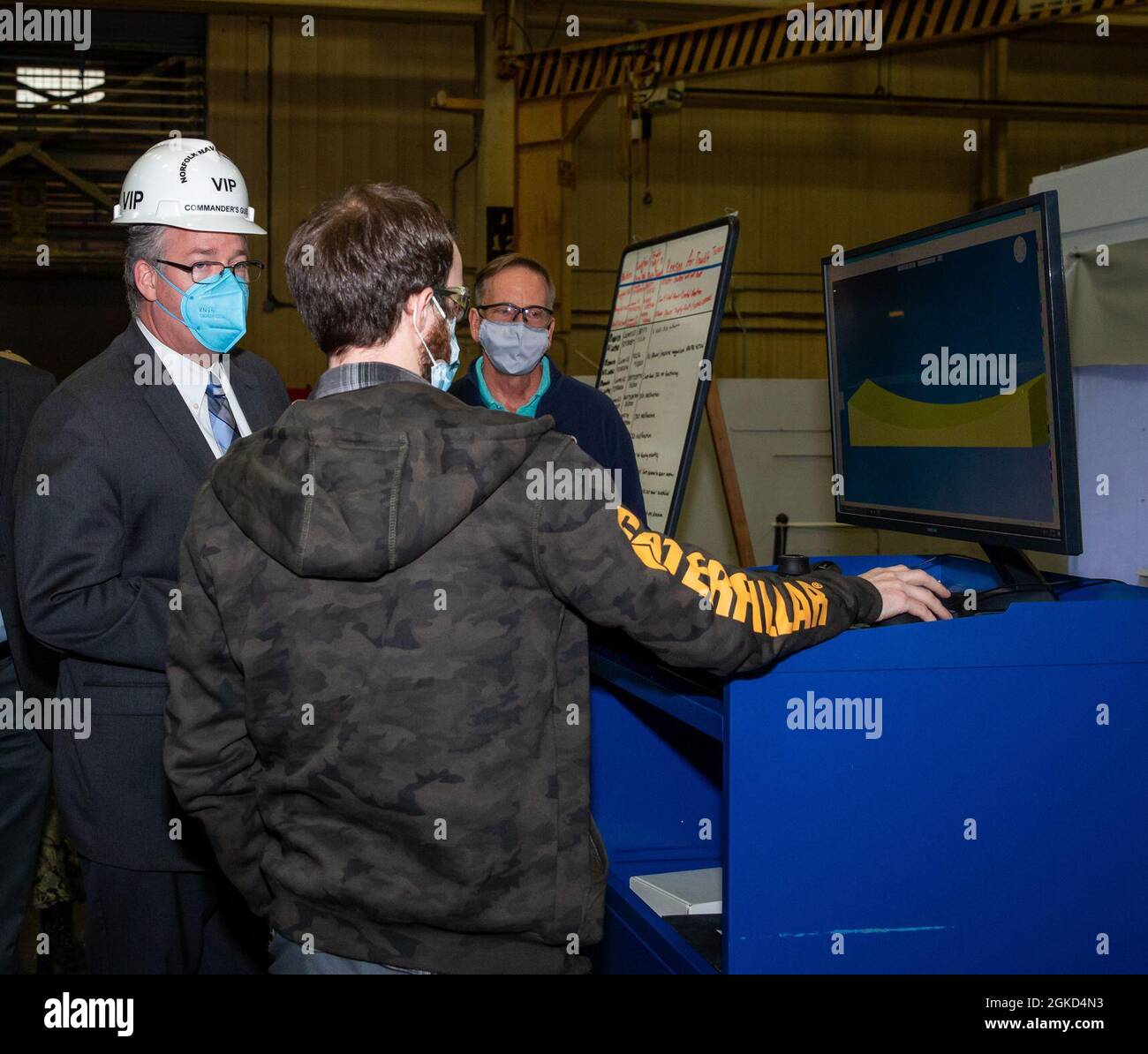 Acting Secretary of the Navy Thomas W. Harker visits the Production ...