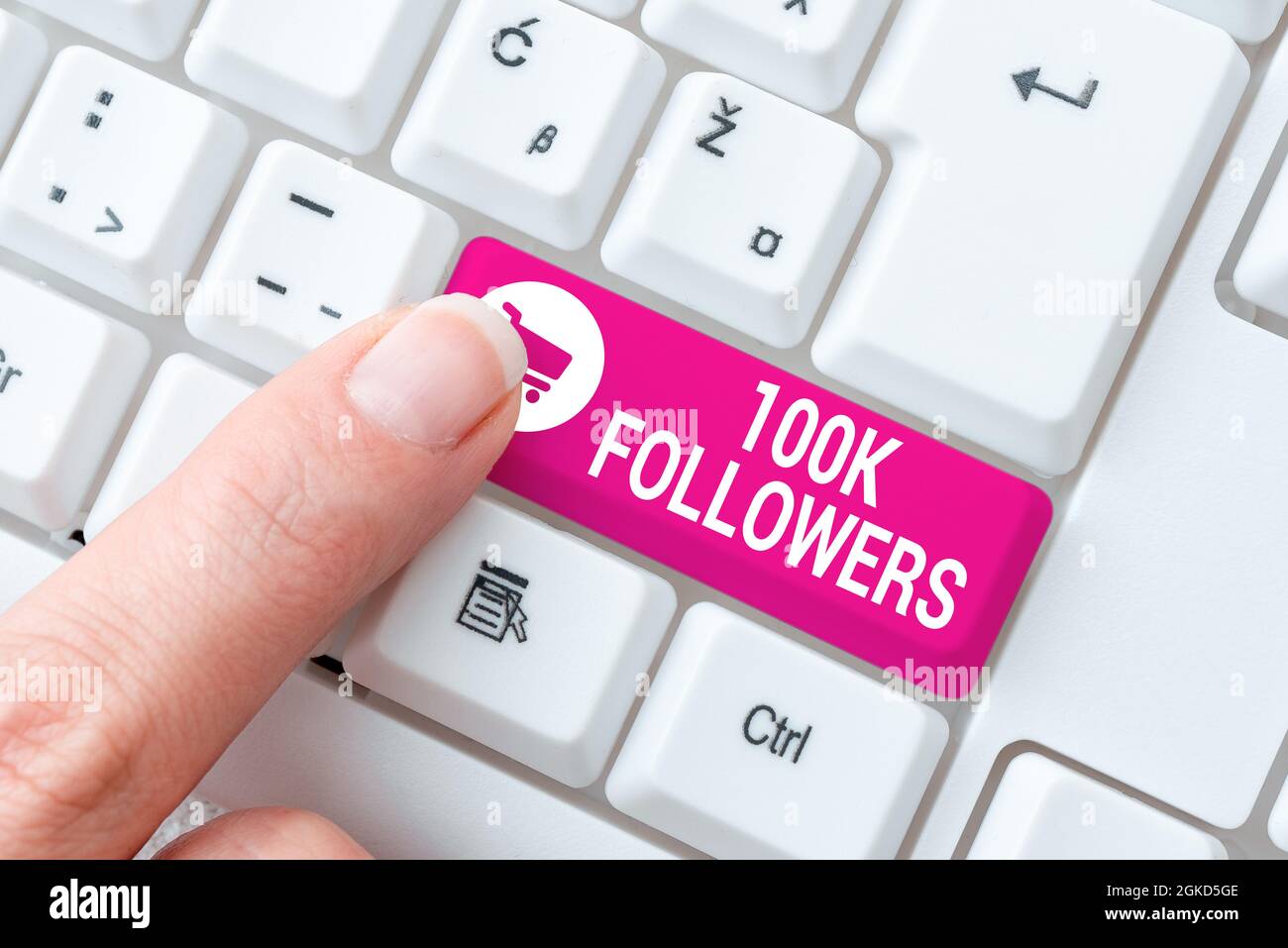 Sign displaying 100K Followers. Word for number of individuals who ...