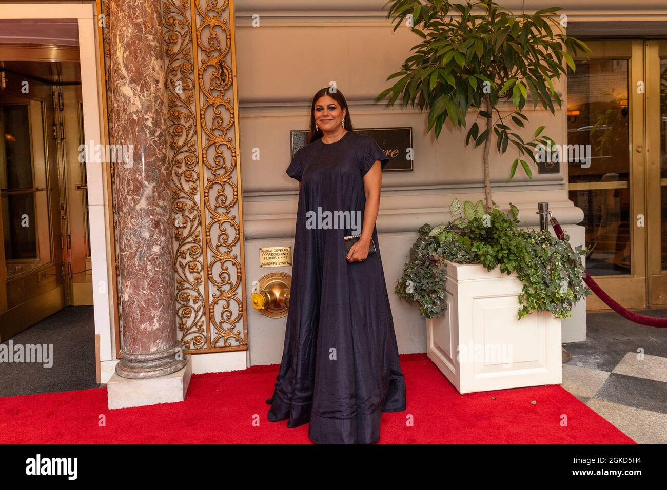 New York, NY - September 13, 2021: Mindy Kaling wearing dress by Tory ...