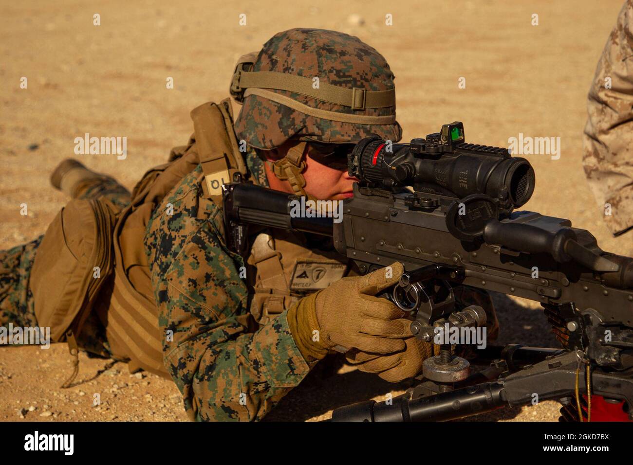 A U.S. Marine with 7th Marine Regiment, 1st Marine Division, sights in ...