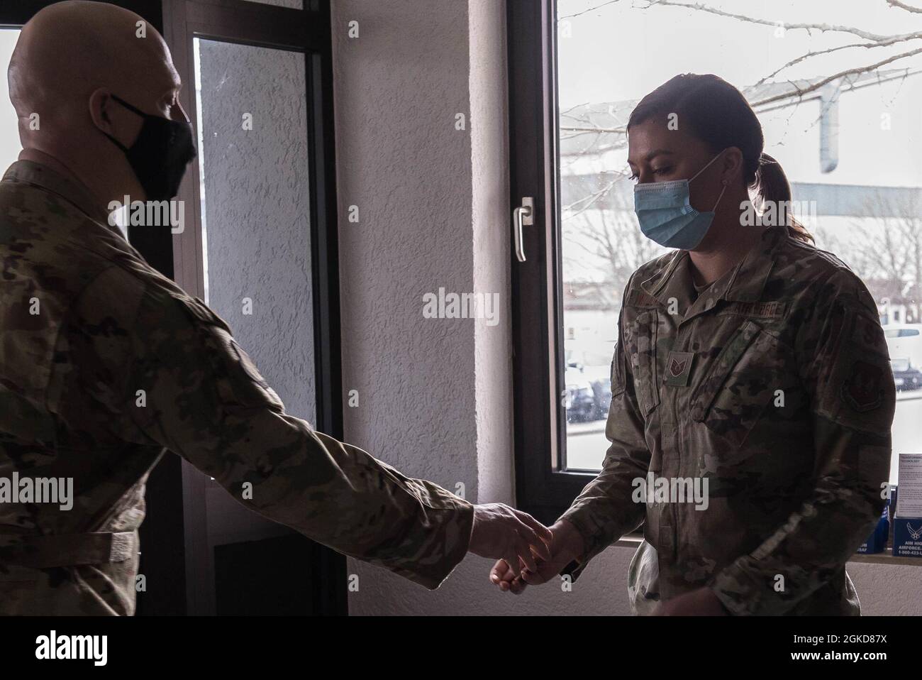 U.S. Air Force Brig. Gen. Josh Olson, 86th Airlift Wing commander, left ...