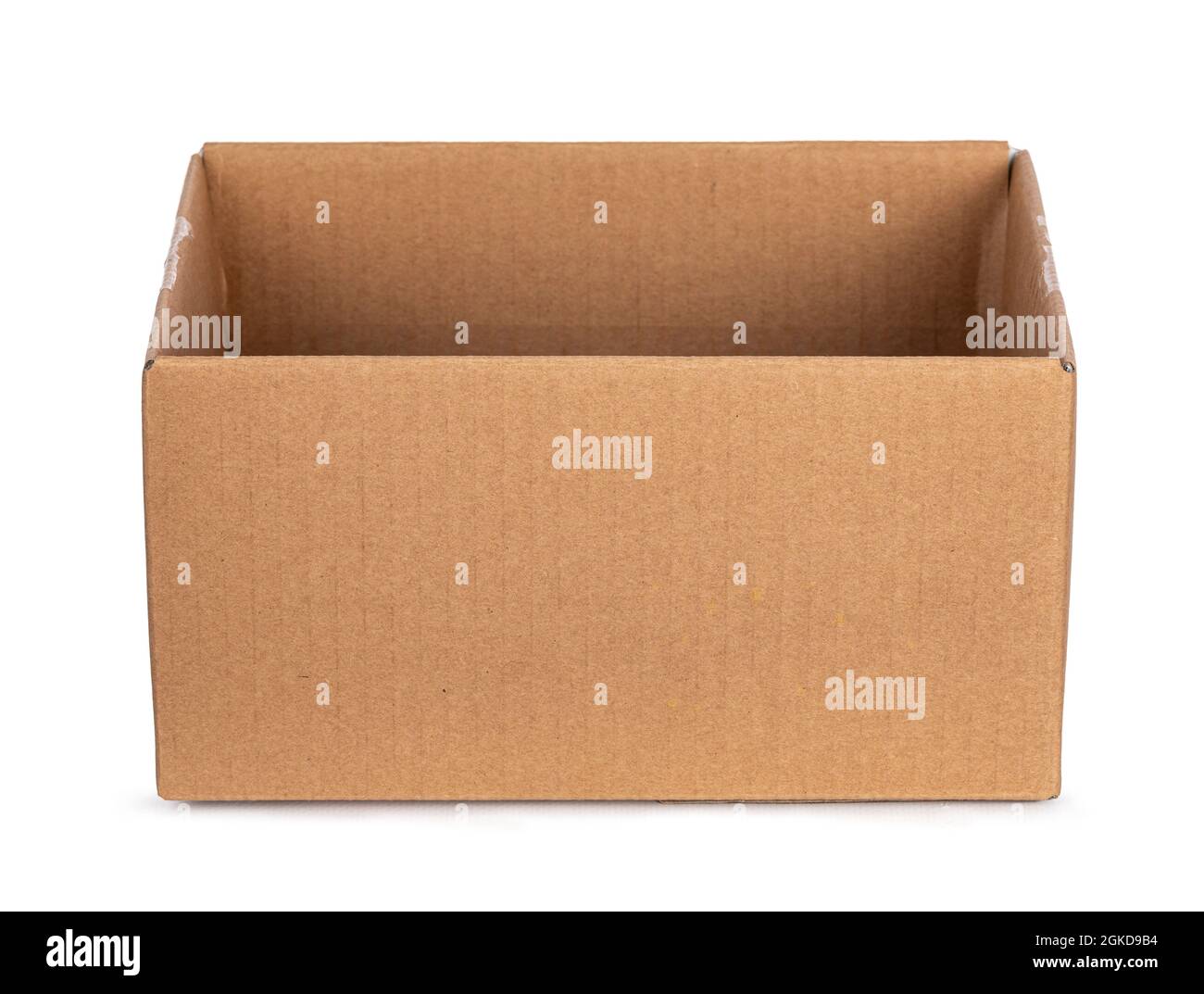 Empty brown carton box, isolated on a white background. Flaps folded ...