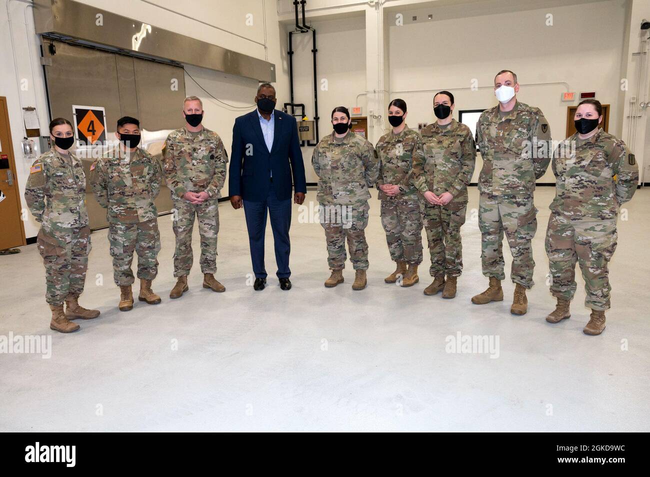 Secretary of Defense Lloyd J. Austin III greets members of the 65th ...