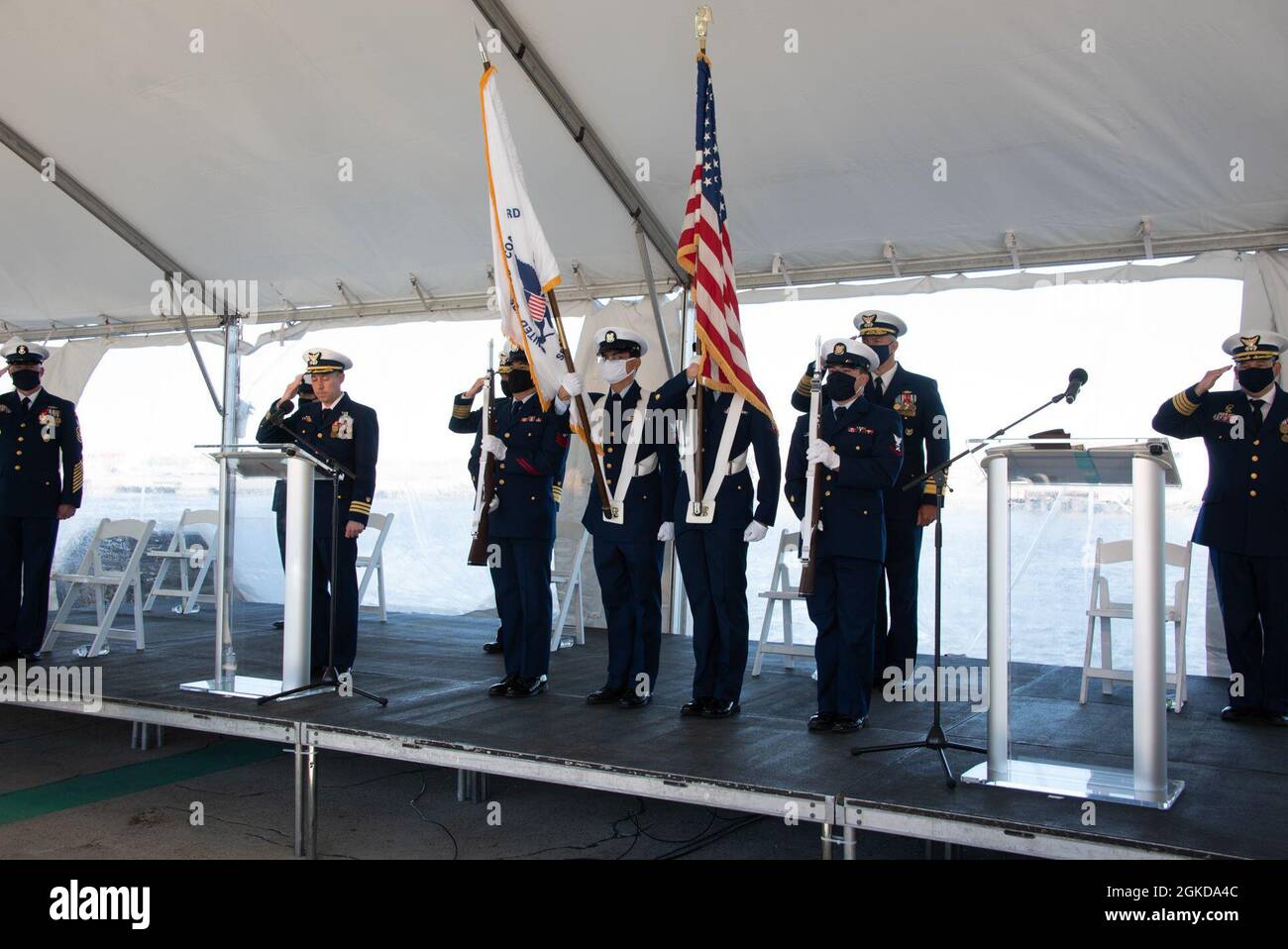 The crew of USCGC Stone (WMSL 758) colors team presents the American ...