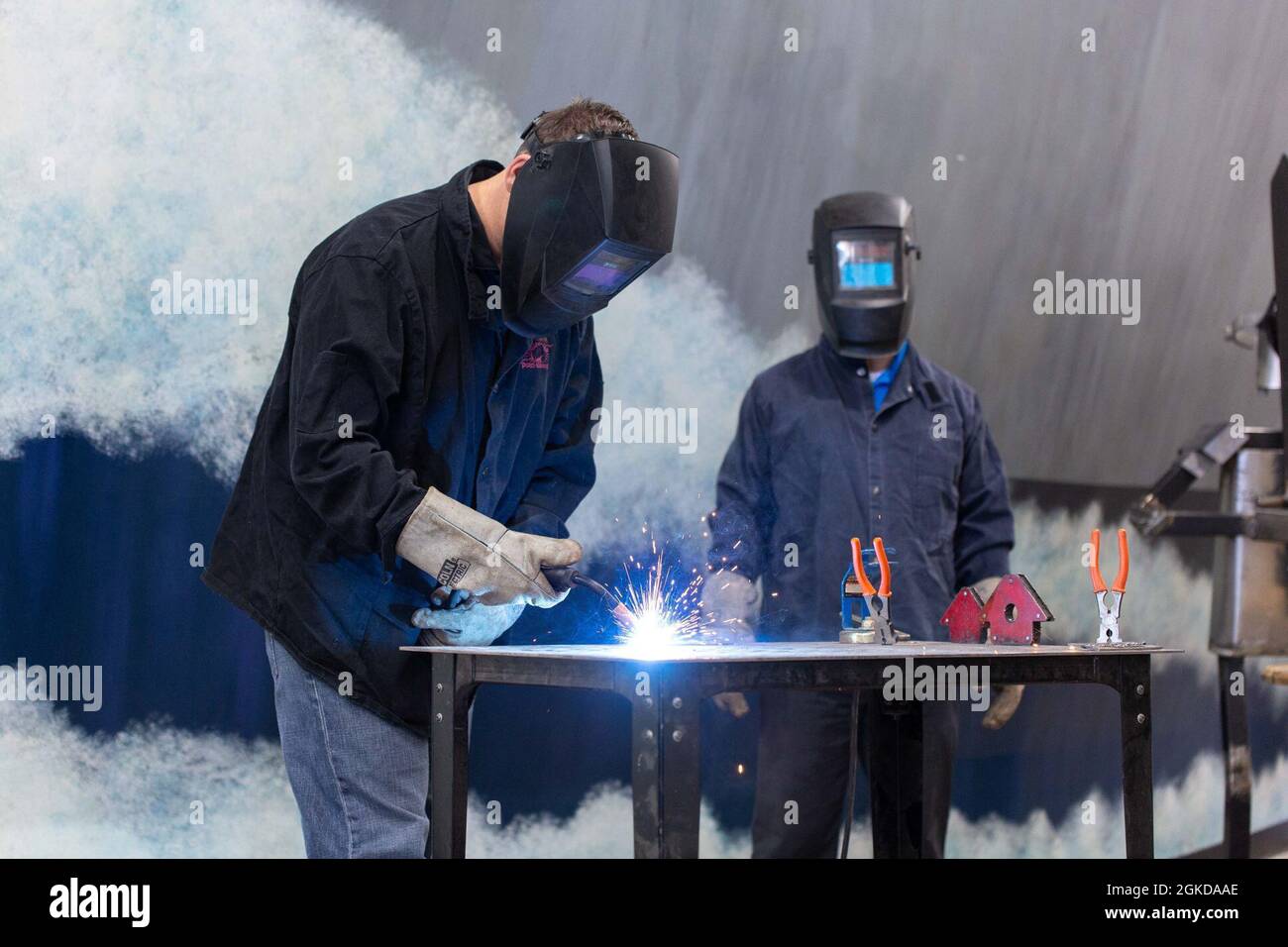 Capt. Ben Van Buskirk relieves Capt. Frank Futcher as NavalX Director ...