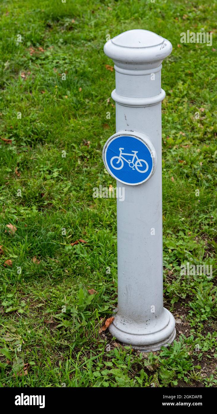 Blue circle with a cyclist images indicating cyclists should use this ...