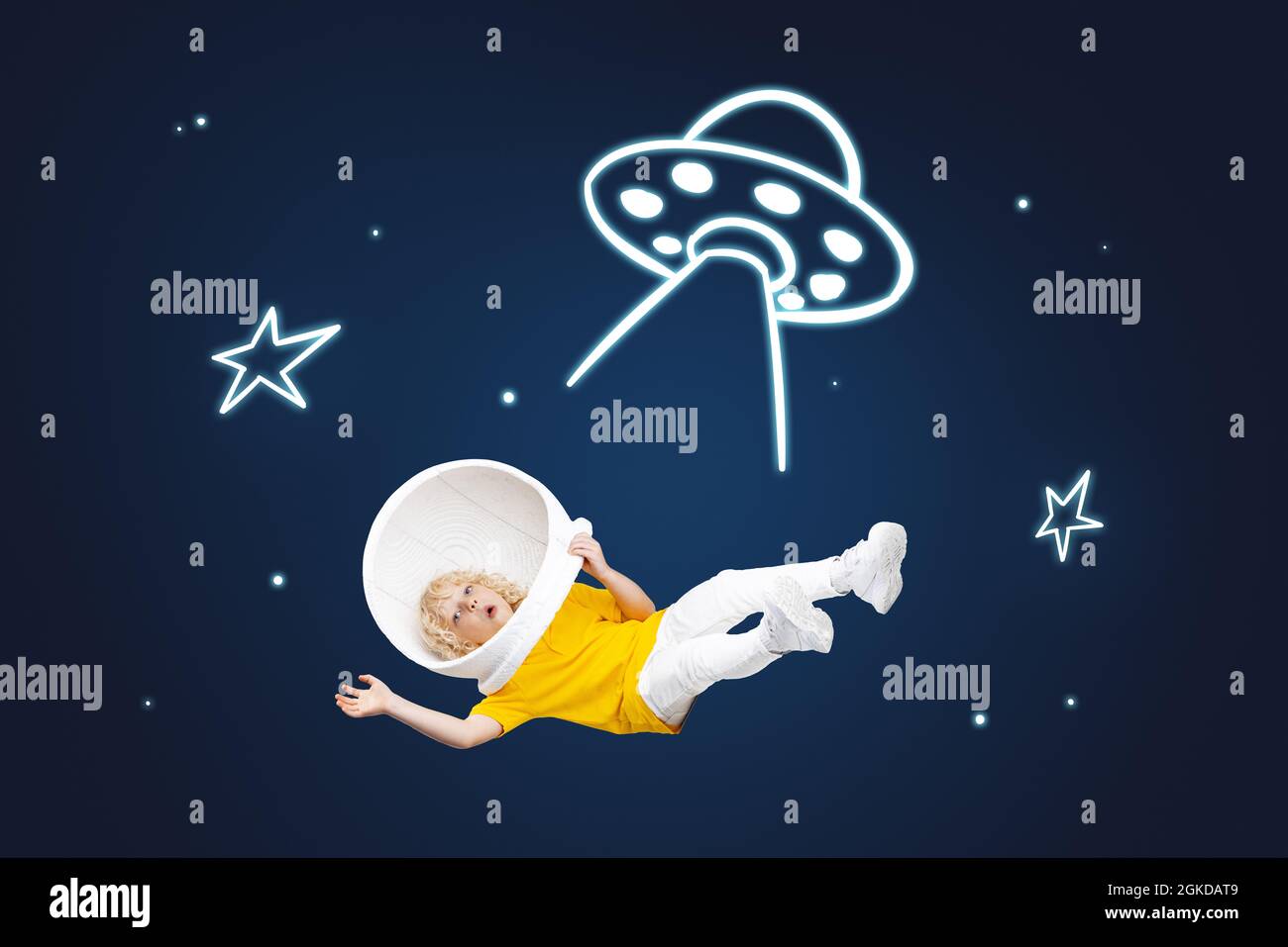 Composite image of little alien boy astronaut isolated over dark blue ...