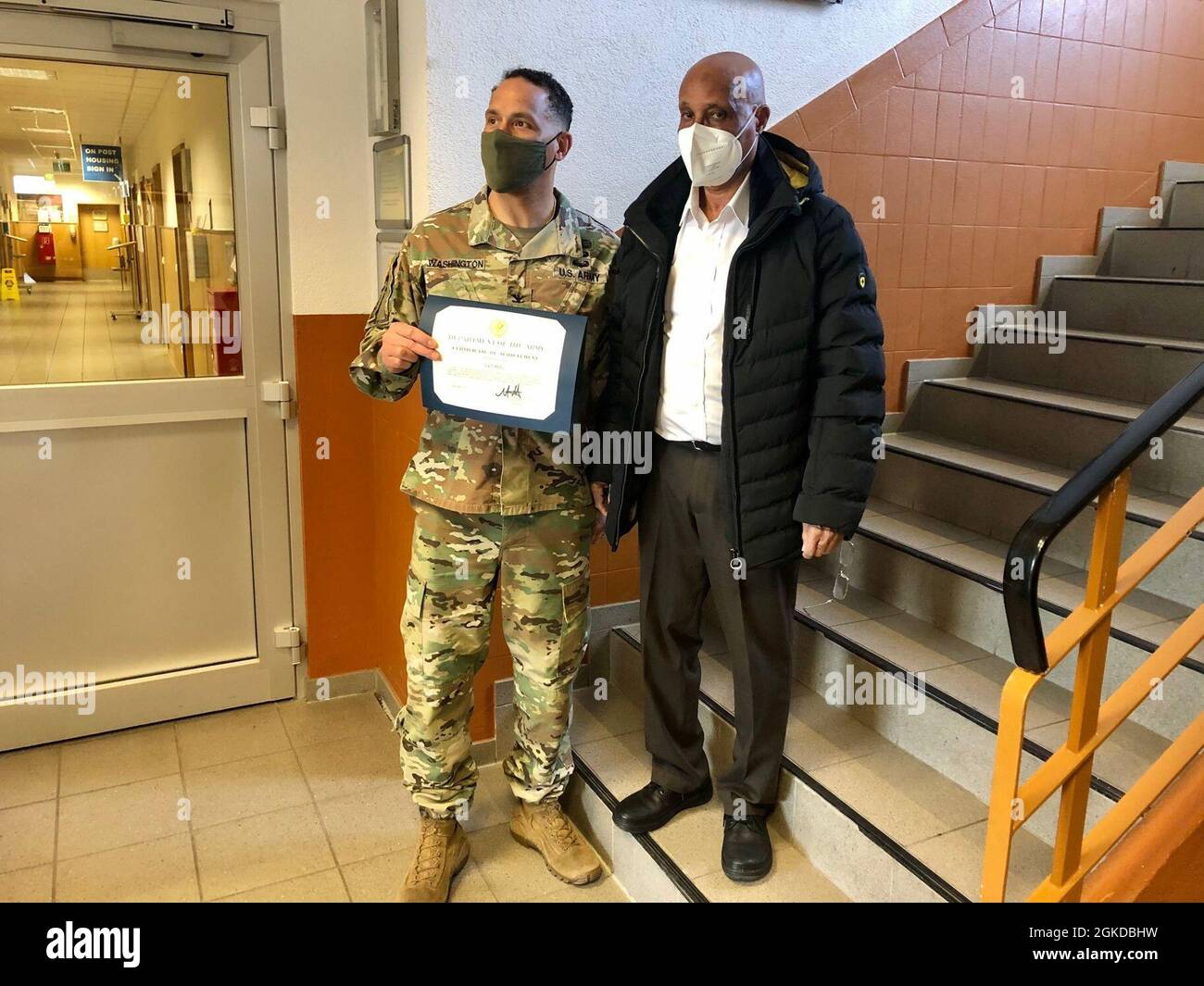 WIESBADEN, Germany -- Salih Abdu, transportation assistant, receives ...