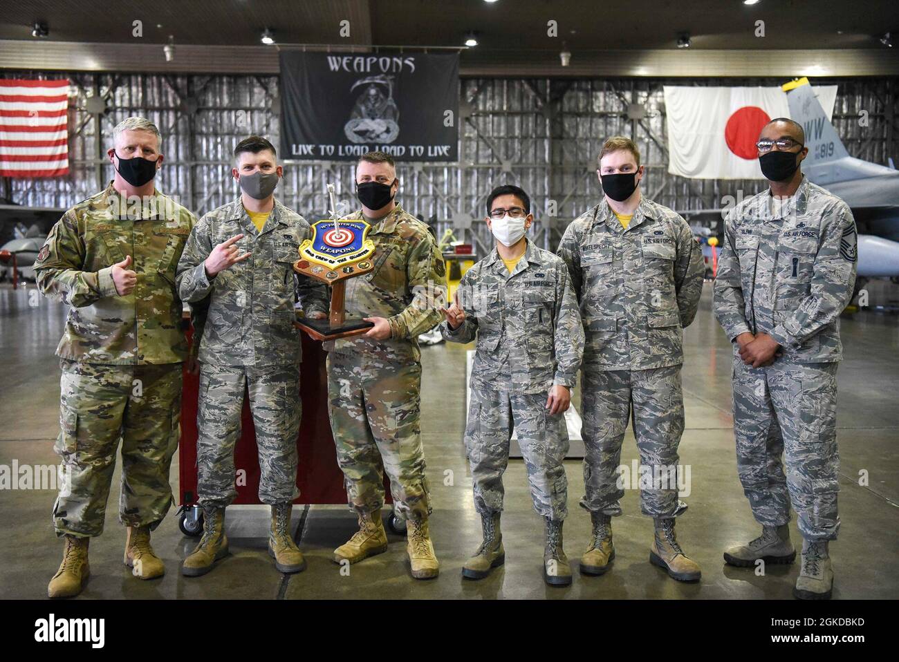 U.S. Air Force Airmen with the 14 Aircraft Maintenance Unit receive a ...