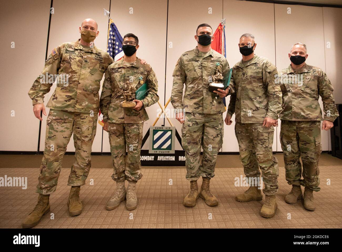 The 3rd Combat Aviation Brigade command team presents the winners of ...