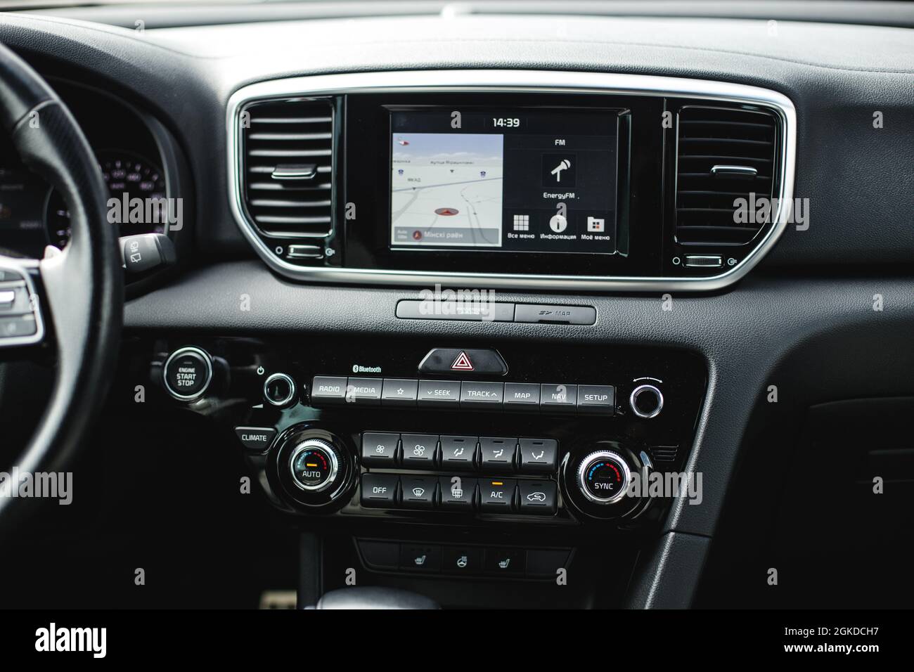 luxury car steering wheel and dashboard with display or monitor screen ...
