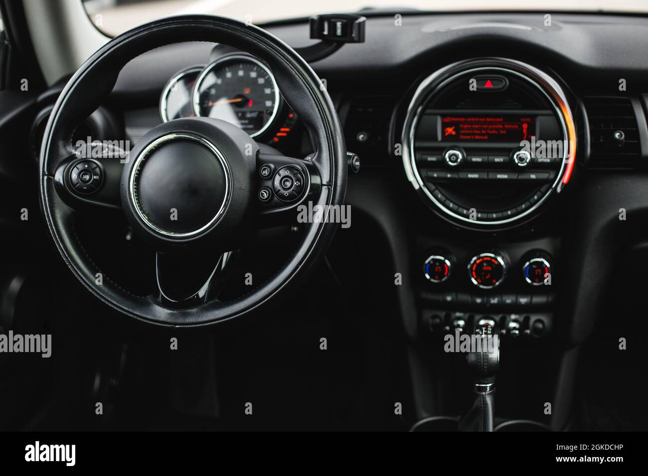 luxury car steering wheel and dashboard with display or monitor screen ...