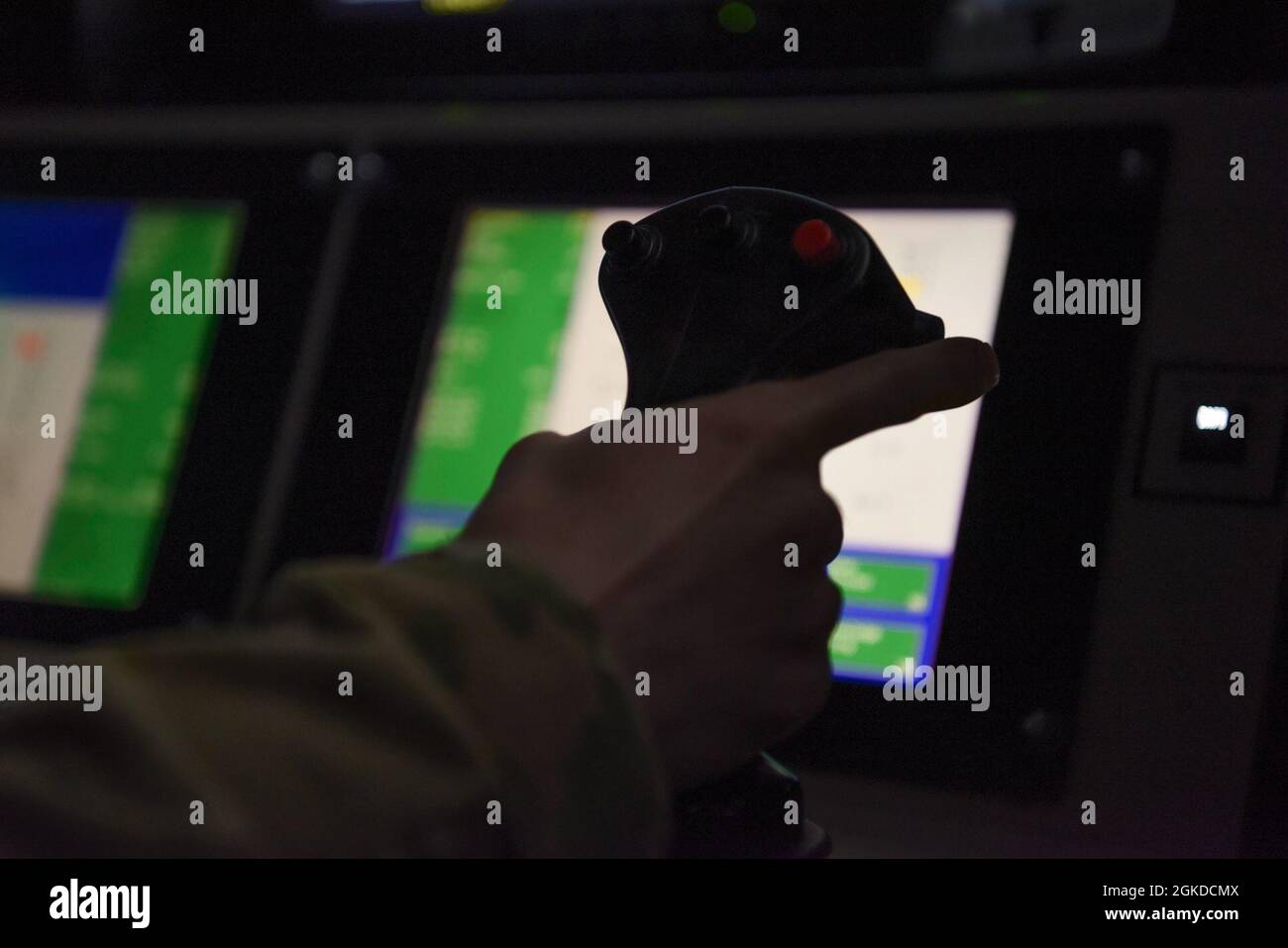 A U.S. Air Force remotely piloted aircraft sensor operator rests his ...