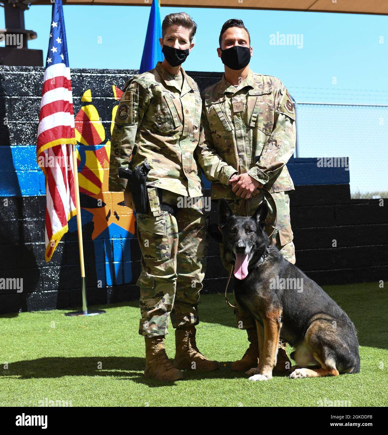Maj. Kimberly Guest, left, 56th Security Forces Squadron commander, and Tech. Sgt. Zackery Hons ...