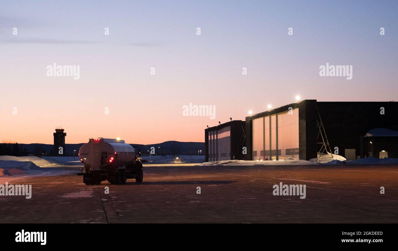 A fuel truck drives on the flightline at Canadian Forces Base Goose Bay ...