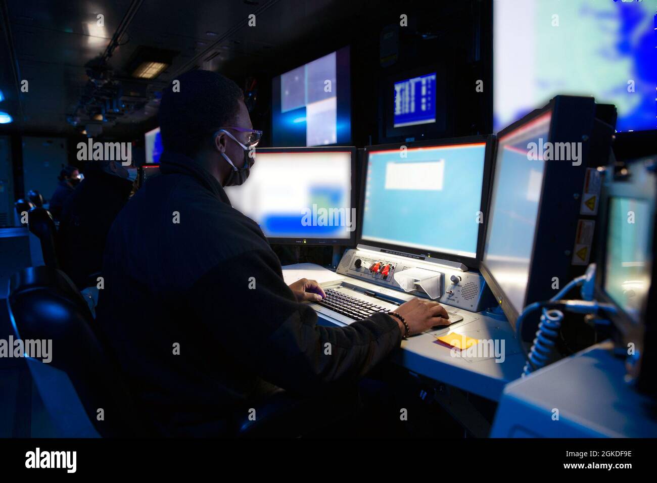 Lt. Reginald Demery, from Savannah, Georgia, monitors the surface ...
