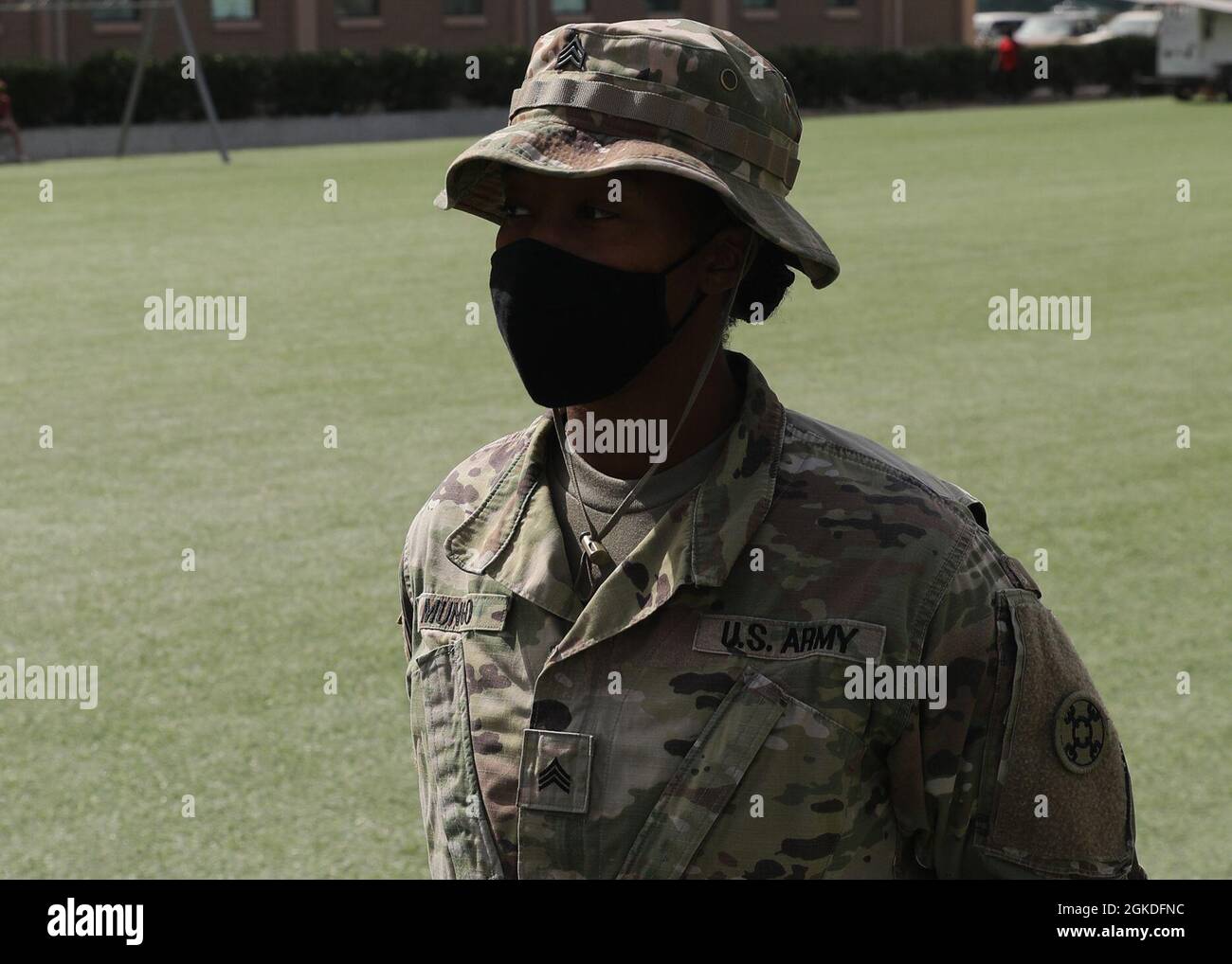 Army Reserve Sgt. Timmea Mungo, 310th Sustainment Command (Expeditionary), stands at parade rest ...