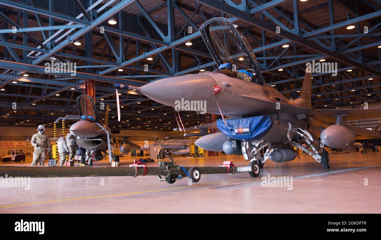 U.S. Air Force Airmen from the 140th Aircraft Maintenance Squadron tow ...