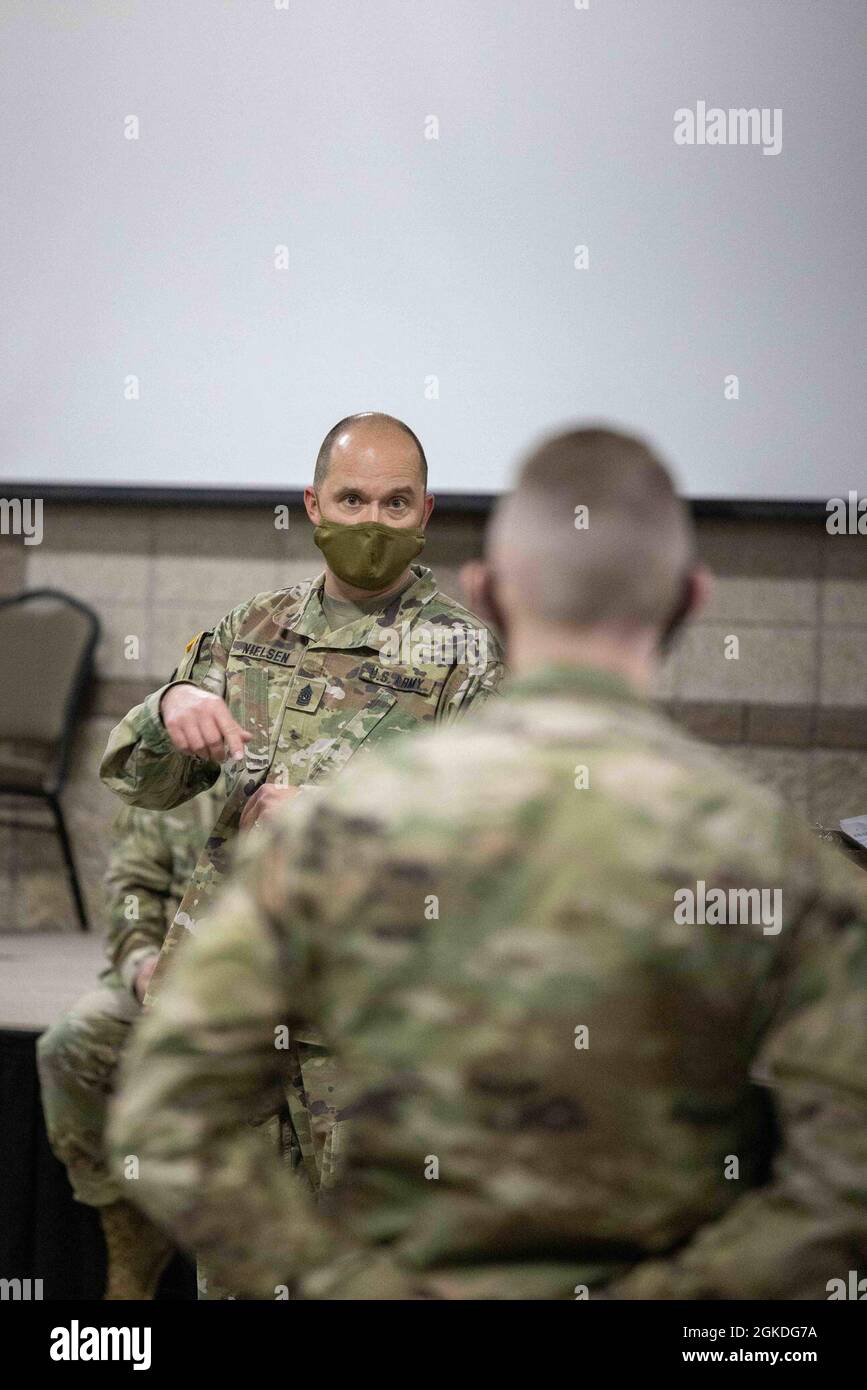 Command Sgt. Maj. Spencer Neilson briefs the Soldiers participating in ...