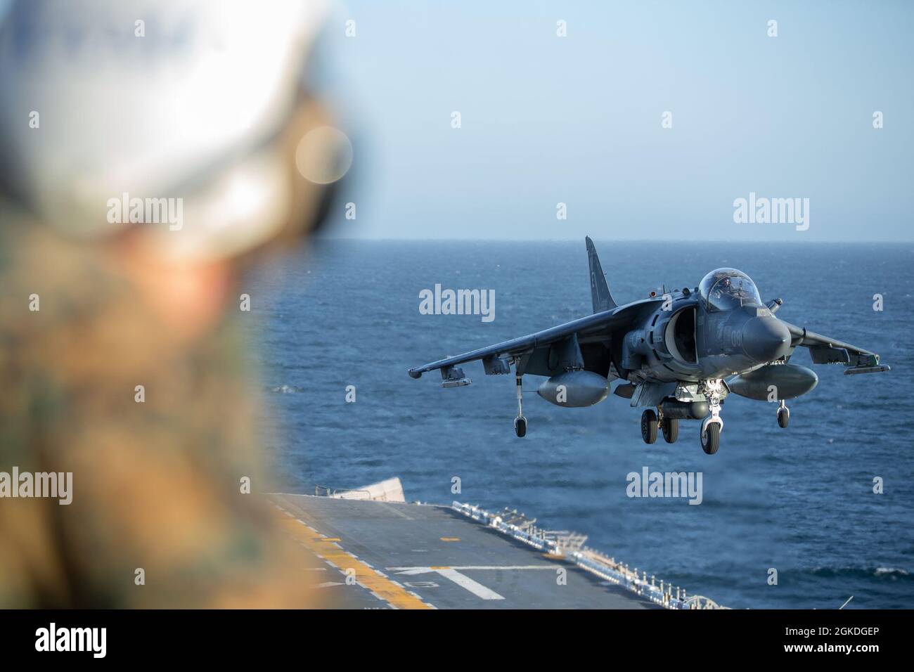 PACIFIC OCEAN (March 21, 2021) An AV-8B Harrier lands on the flight ...
