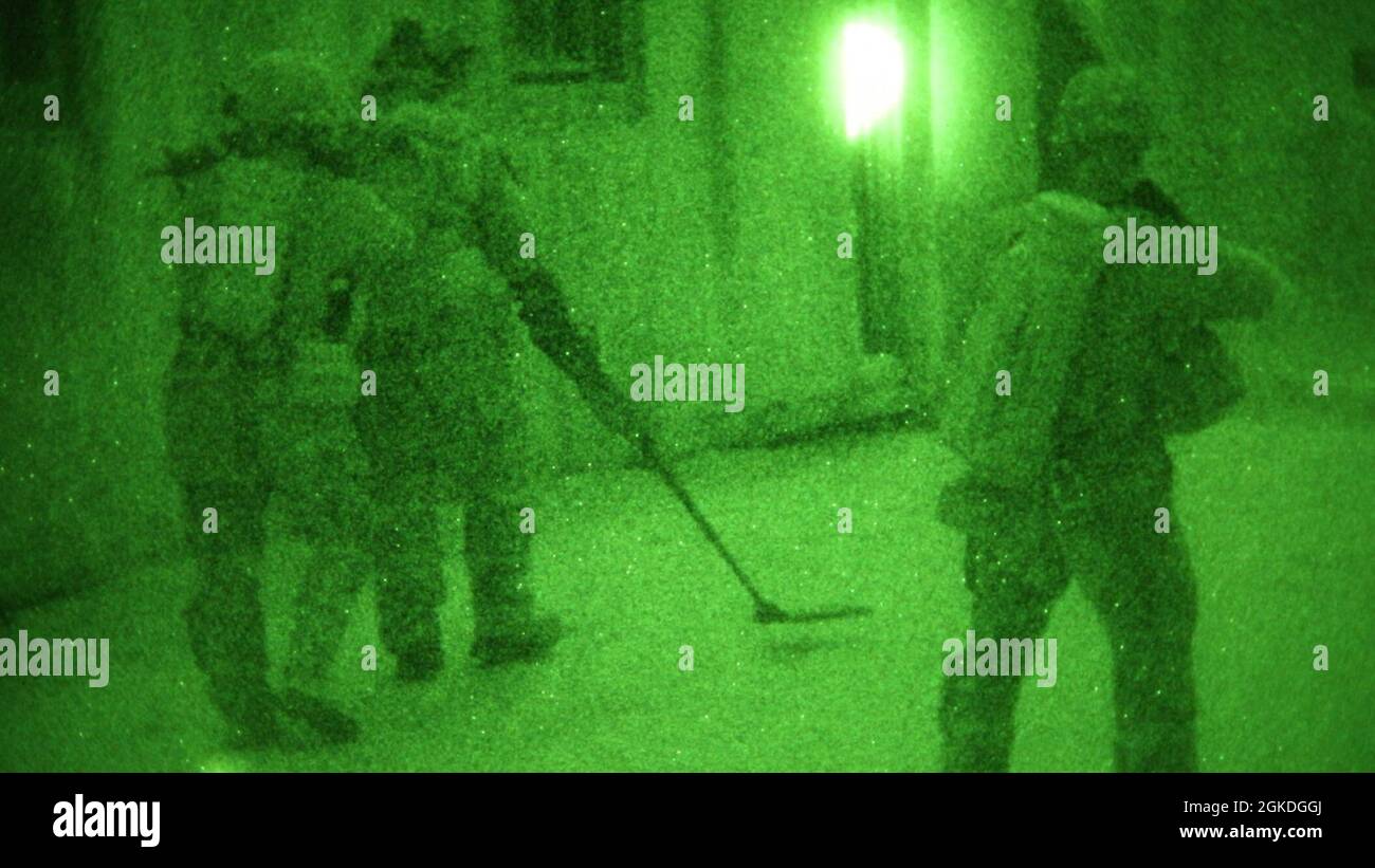 A U.S. Army EOD Technician from 53rd Ordnance Company (EOD) clears a ...