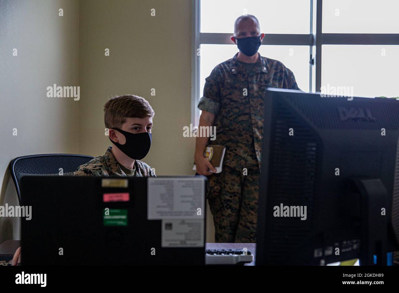 U.S. Marine Corps Lance Cpl. Emma Bowyer, a tax preparer with the Legal ...